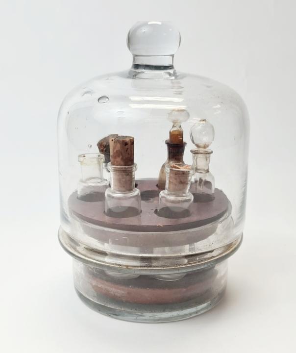 Glass domed medicine bottle container | CURIOUS SCIENCE