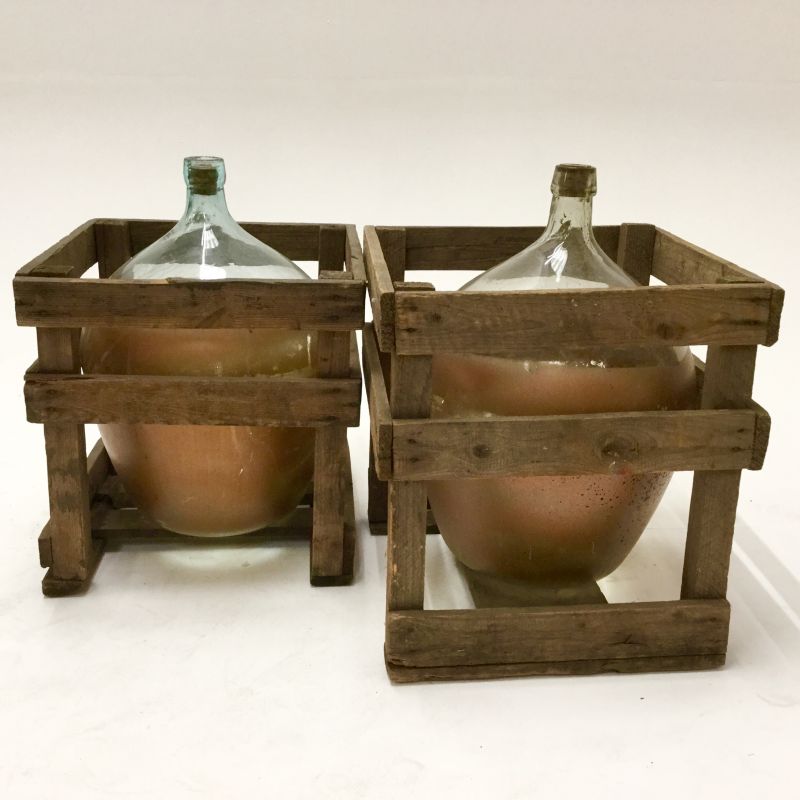 Large glass flagons in crates | CURIOUS SCIENCE