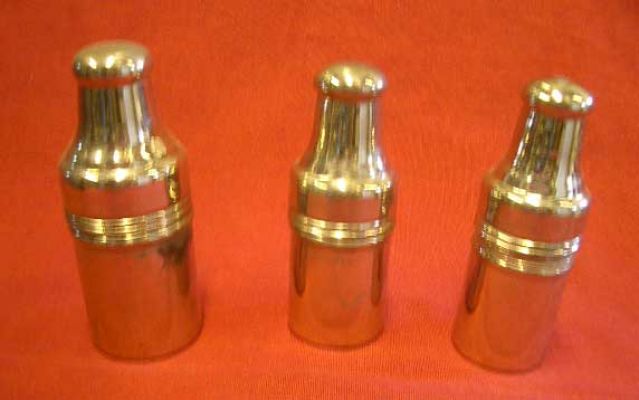 Stoppered bottles in plated containers | CURIOUS SCIENCE